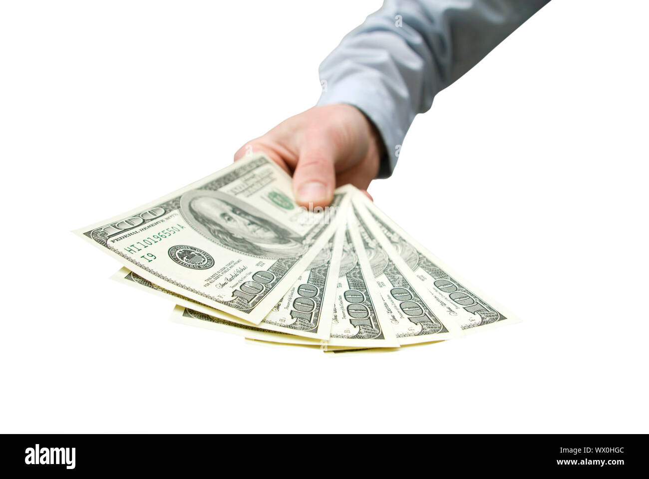 Money in hand isolated on white background Stock Photo - Alamy