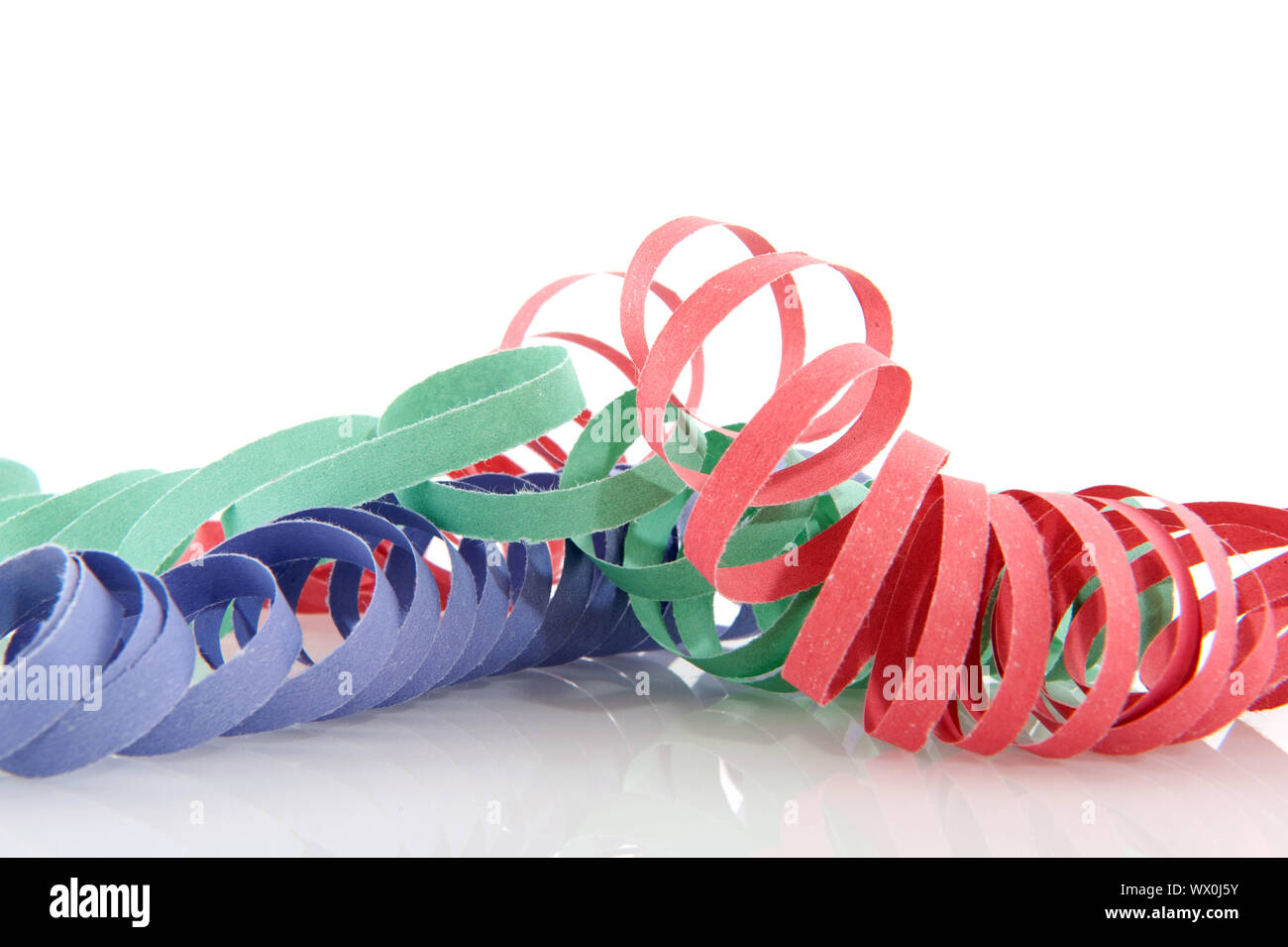 Colorful party streamers from paper isolated over white Stock Photo - Alamy