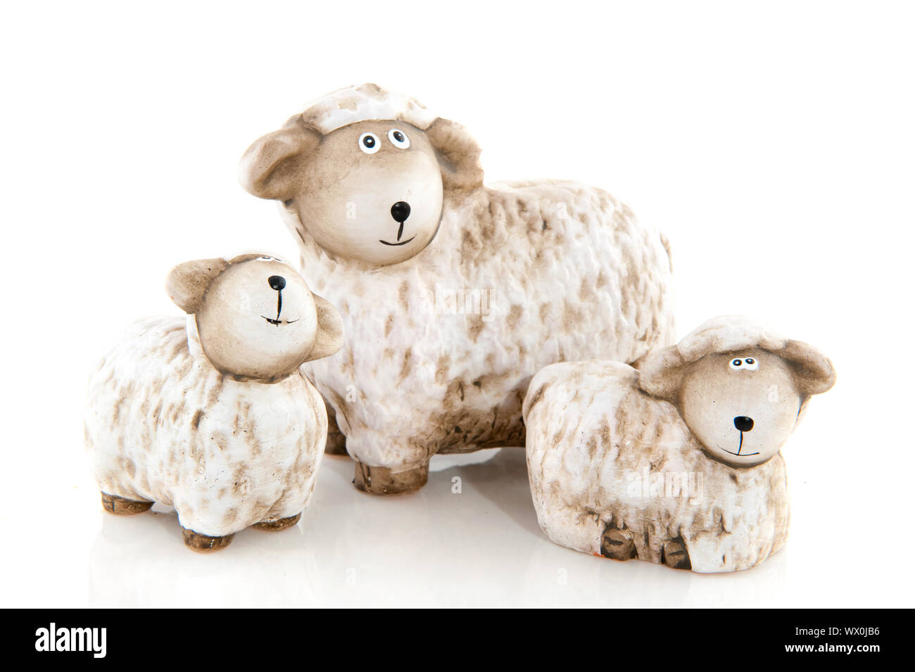 White wool sheep with two little lambs in spring Stock Photo - Alamy