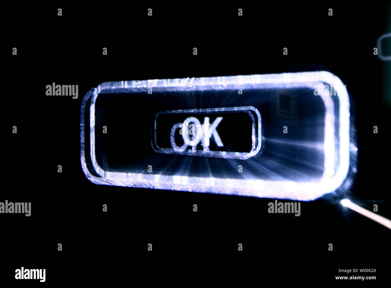 abstract ok button in dark Stock Photo - Alamy
