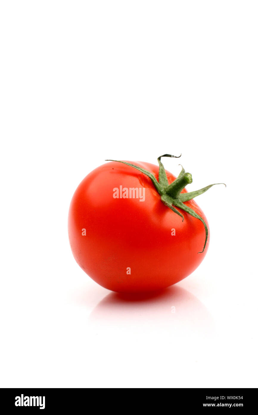one tomato isolated on white background Stock Photo - Alamy