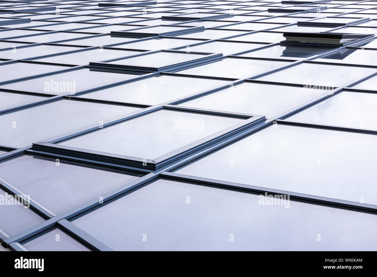Close-up of glass window on building facade surface Stock Photo - Alamy