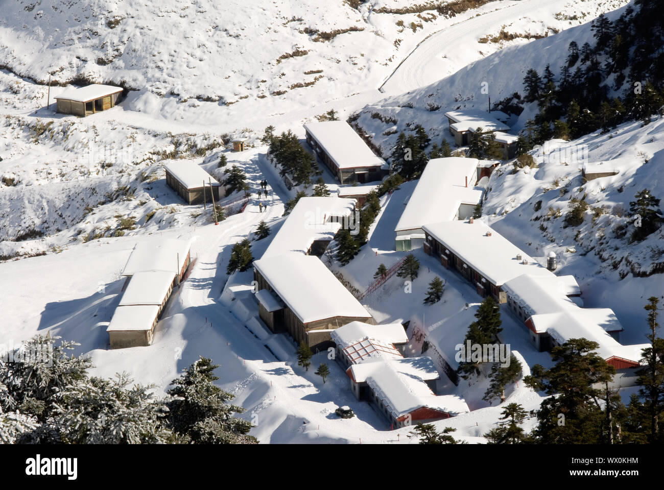 Snow town in winter with white buildings and house Stock Photo - Alamy