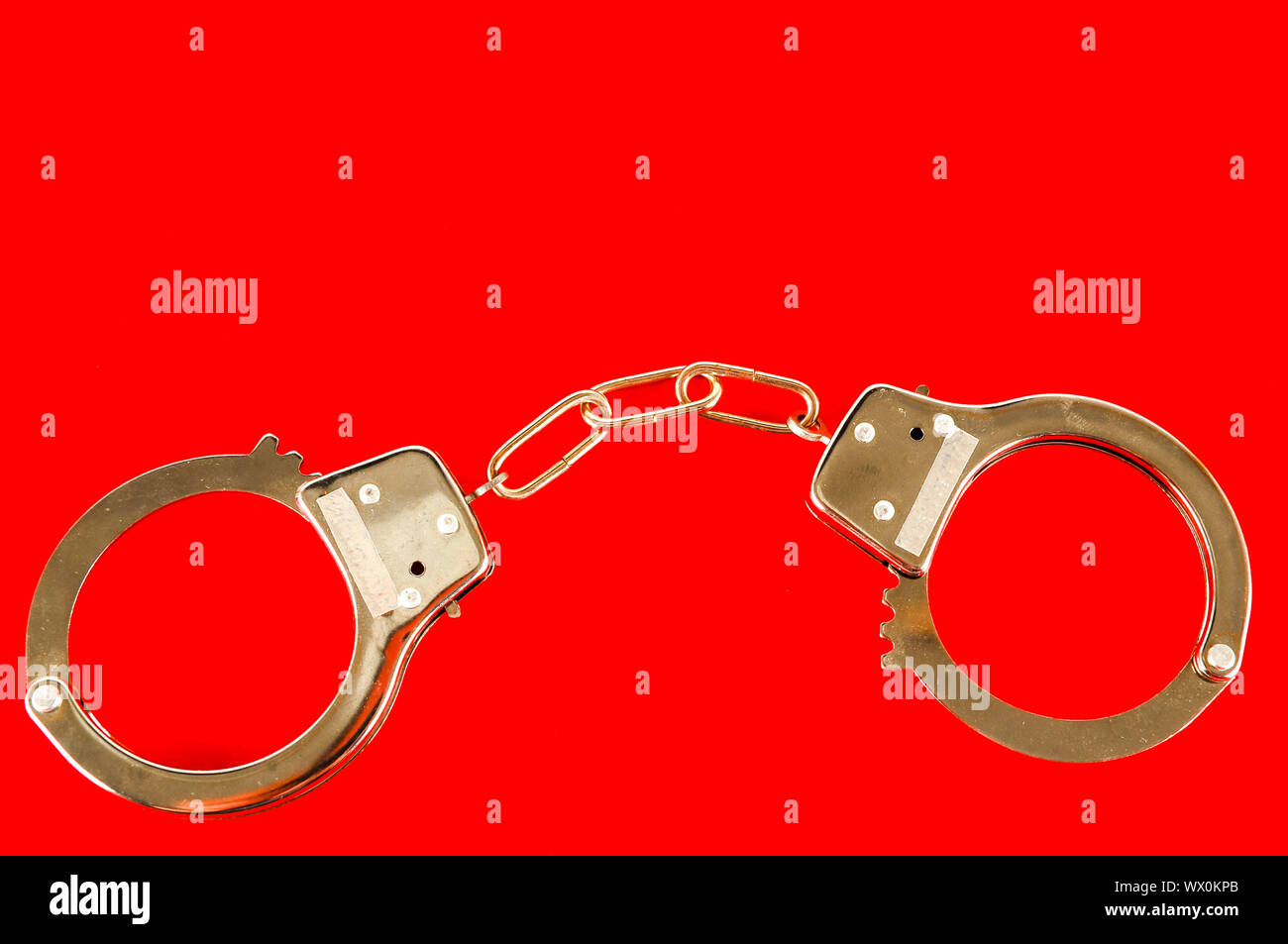 Modern handcuffs hi-res stock photography and images - Alamy