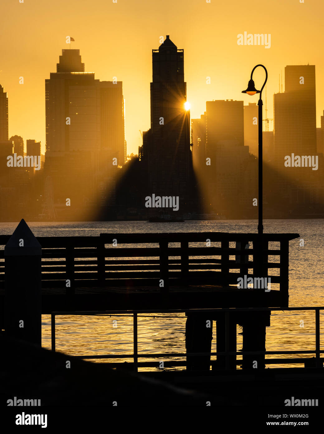 Seattle skyline at sunrise, as seen from Alki Beach, Seattle ...
