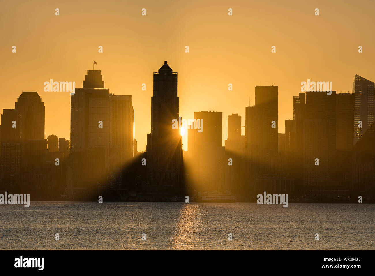 Seattle skyline at sunrise, as seen from Alki Beach, Seattle ...