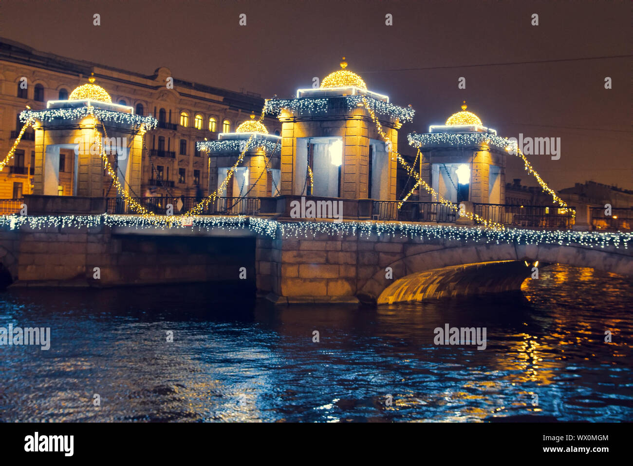Festive bridge hung with garlands, decorative illumination Stock Photo ...