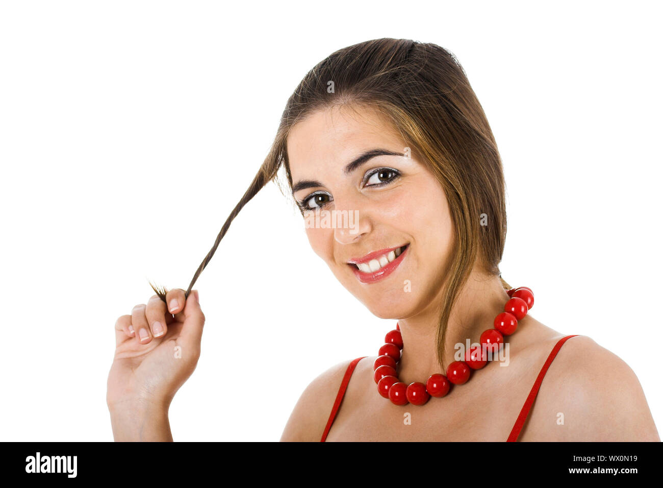 Portrait of a beautiful Young woman smiling and grabbing his hair Stock ...