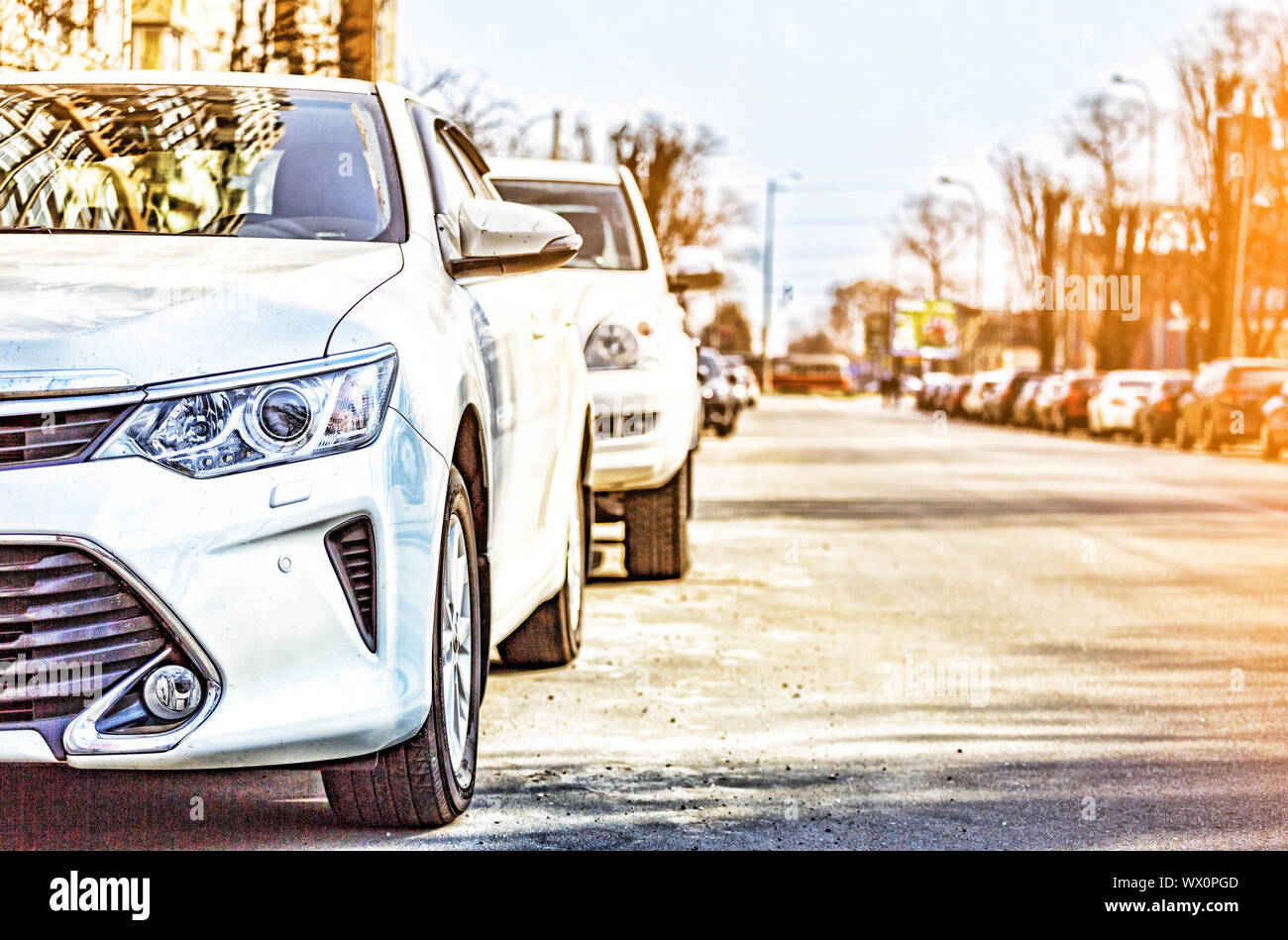 car, city, luxury, many, modern, outdoor, park, road, street, traffic ...