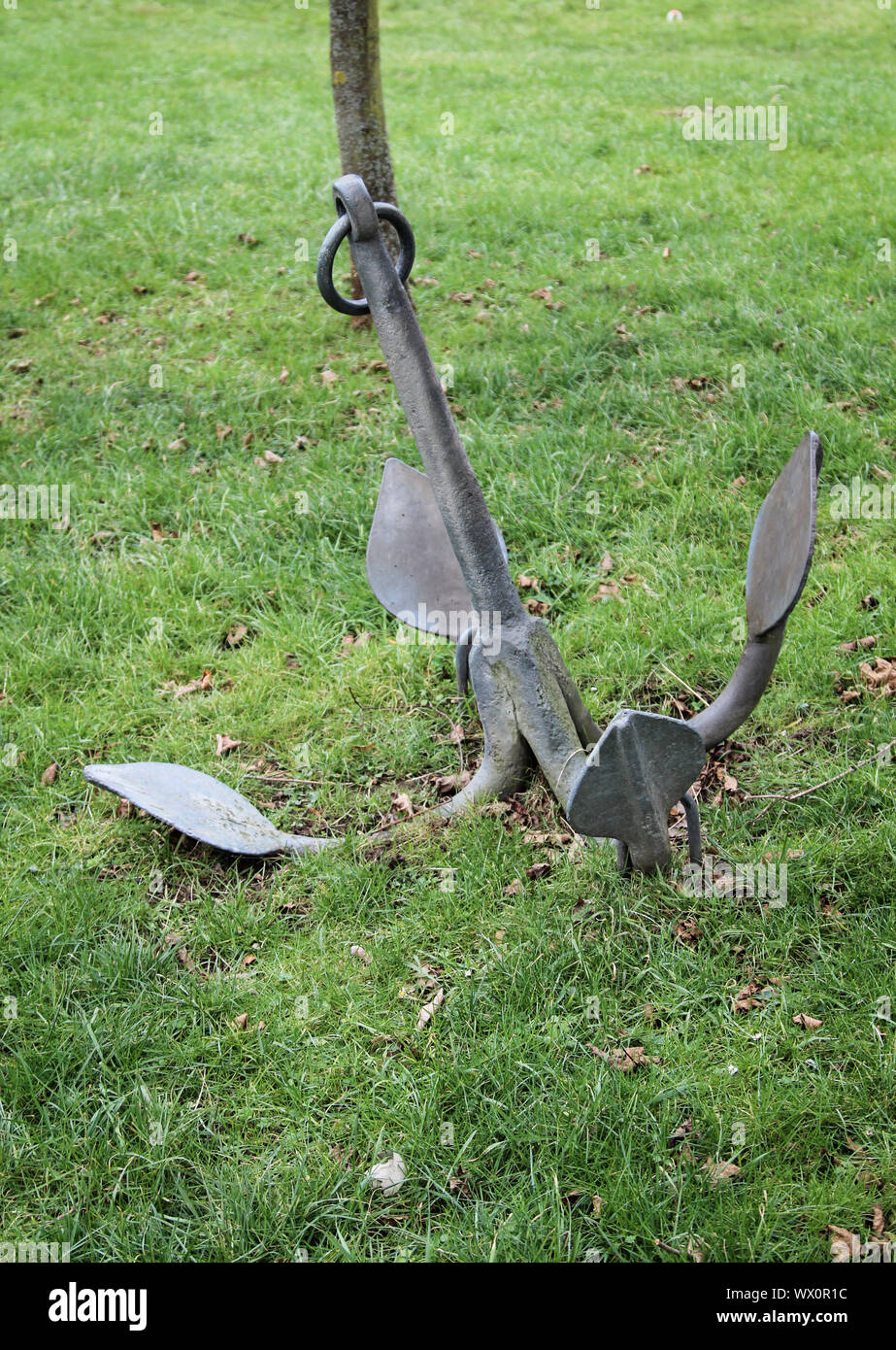 Anchor, old anchor on a meadow, grass Stock Photo - Alamy