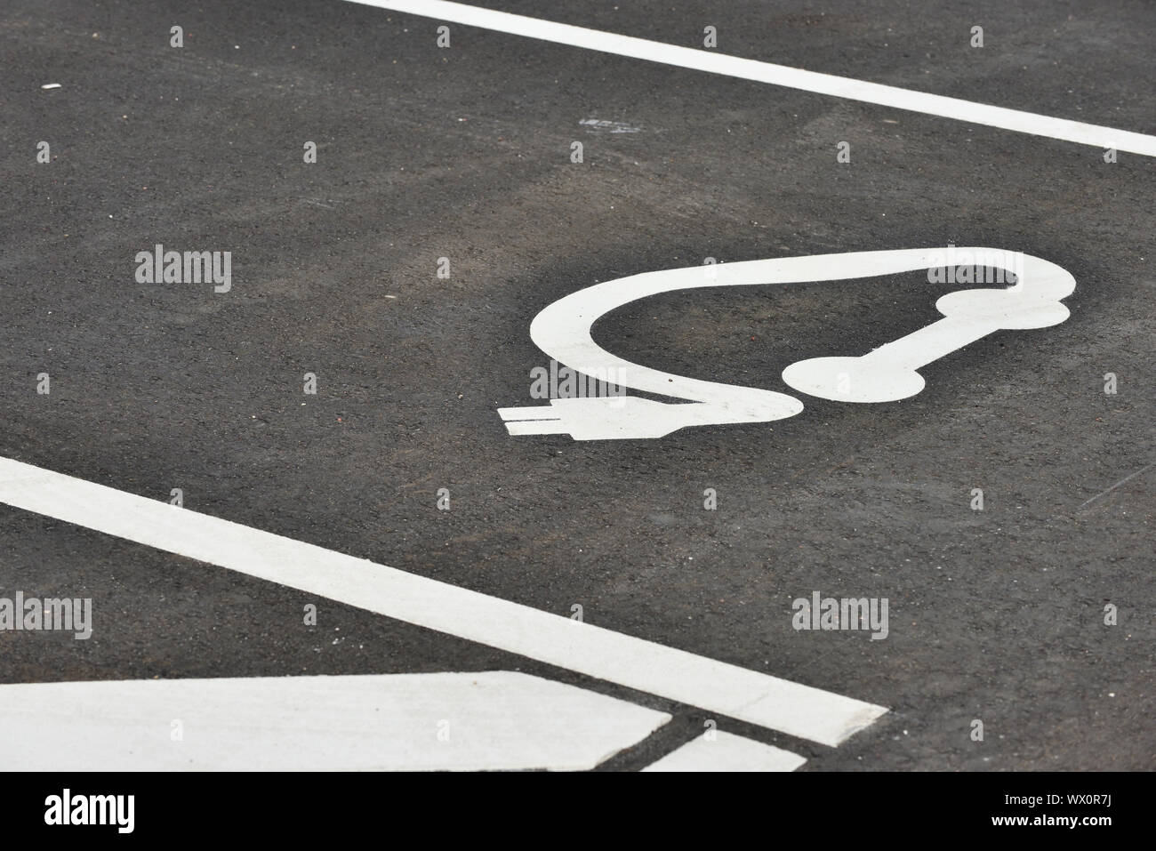 Electric station symbol for electric cars in parking area Stock Photo ...