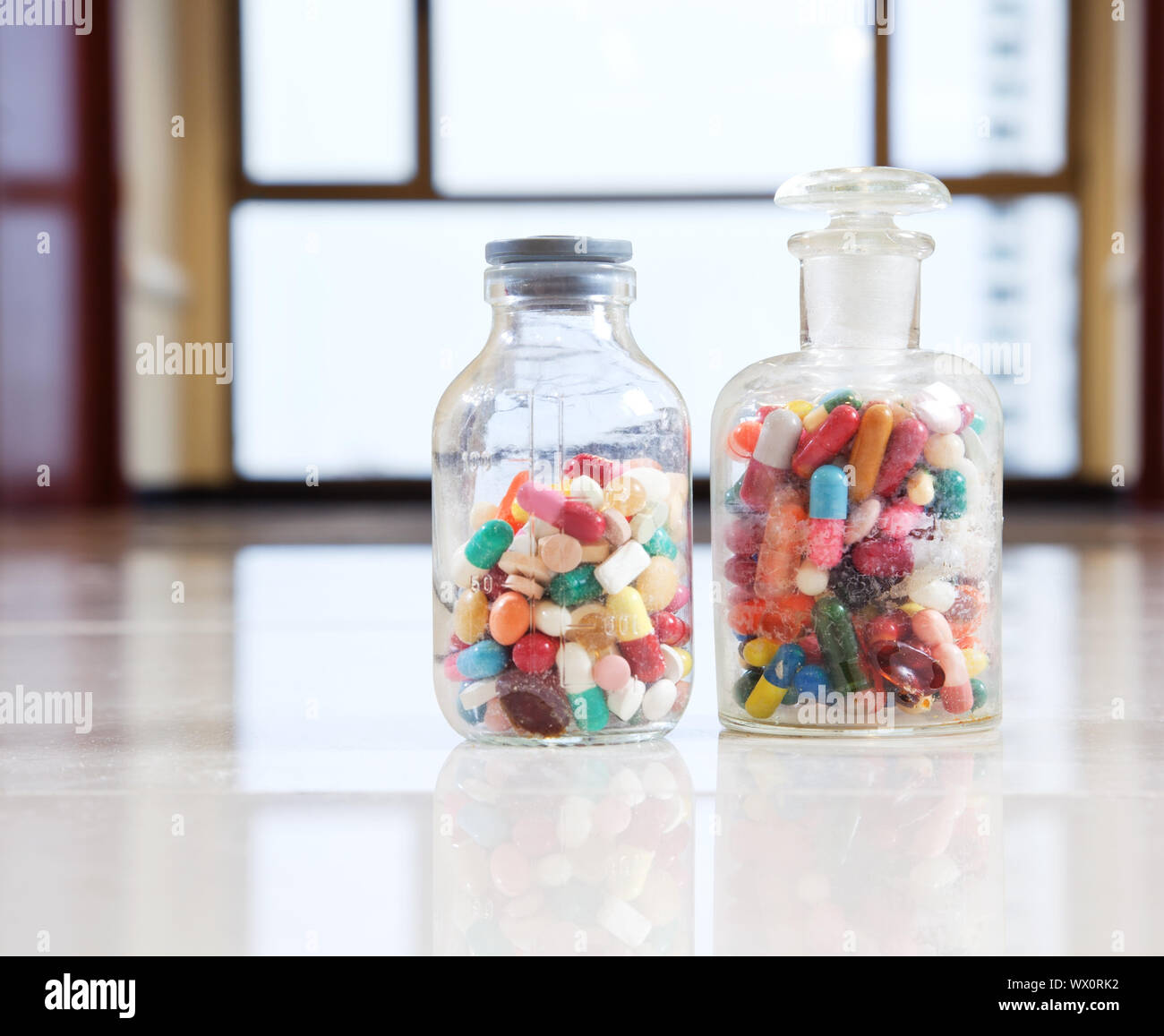 Bottles with tablets and capsules Stock Photo - Alamy