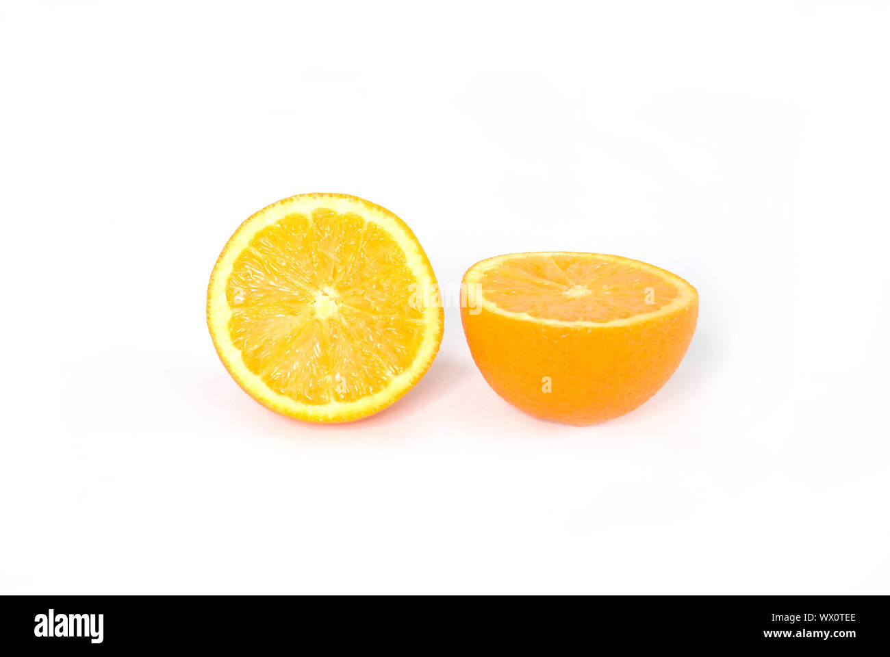 two slice of orange isolated on white Stock Photo - Alamy