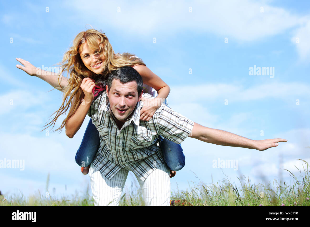 man and woman hug in the sky Stock Photo - Alamy