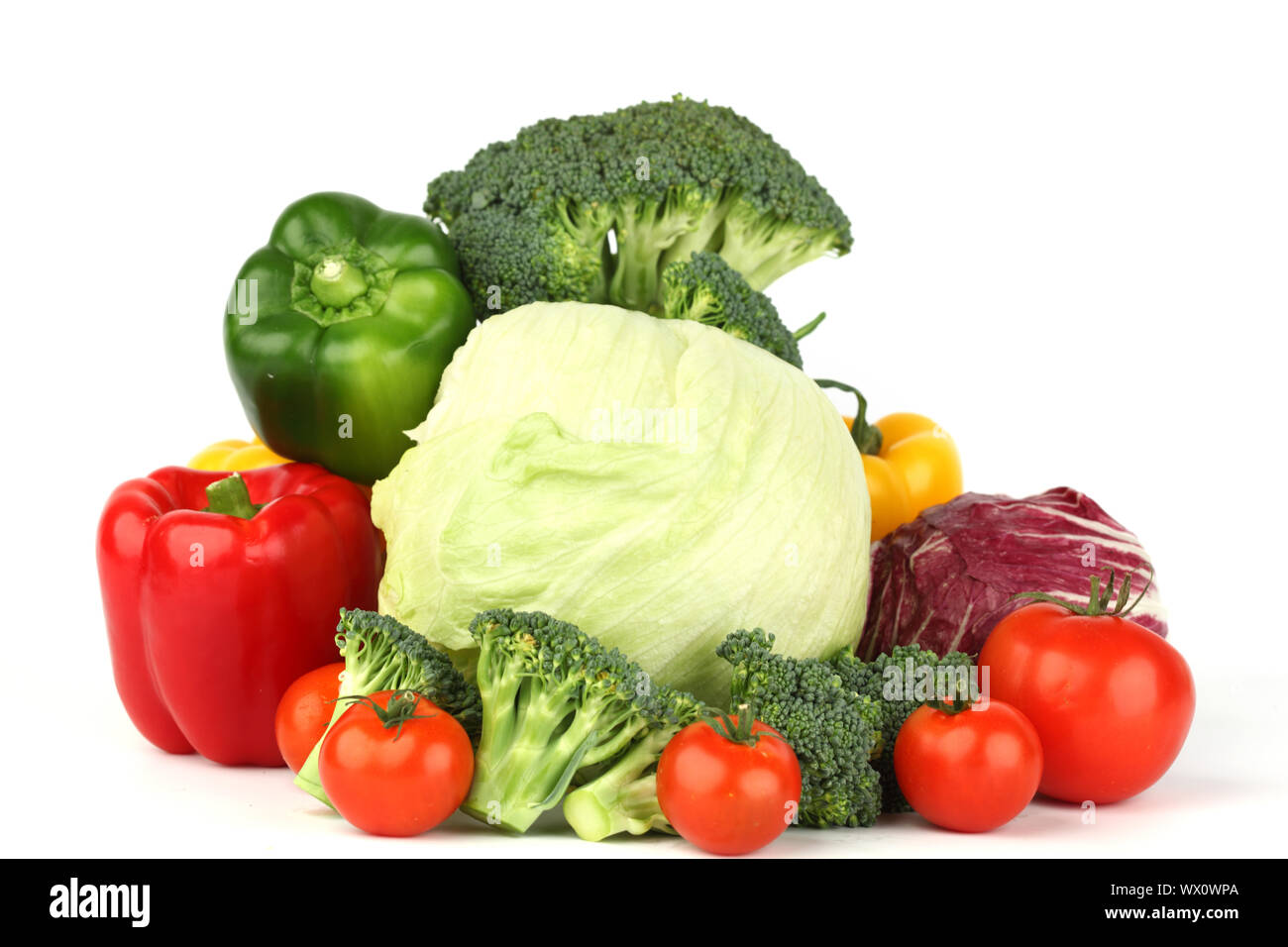 vegetable pile isolated on white Stock Photo - Alamy