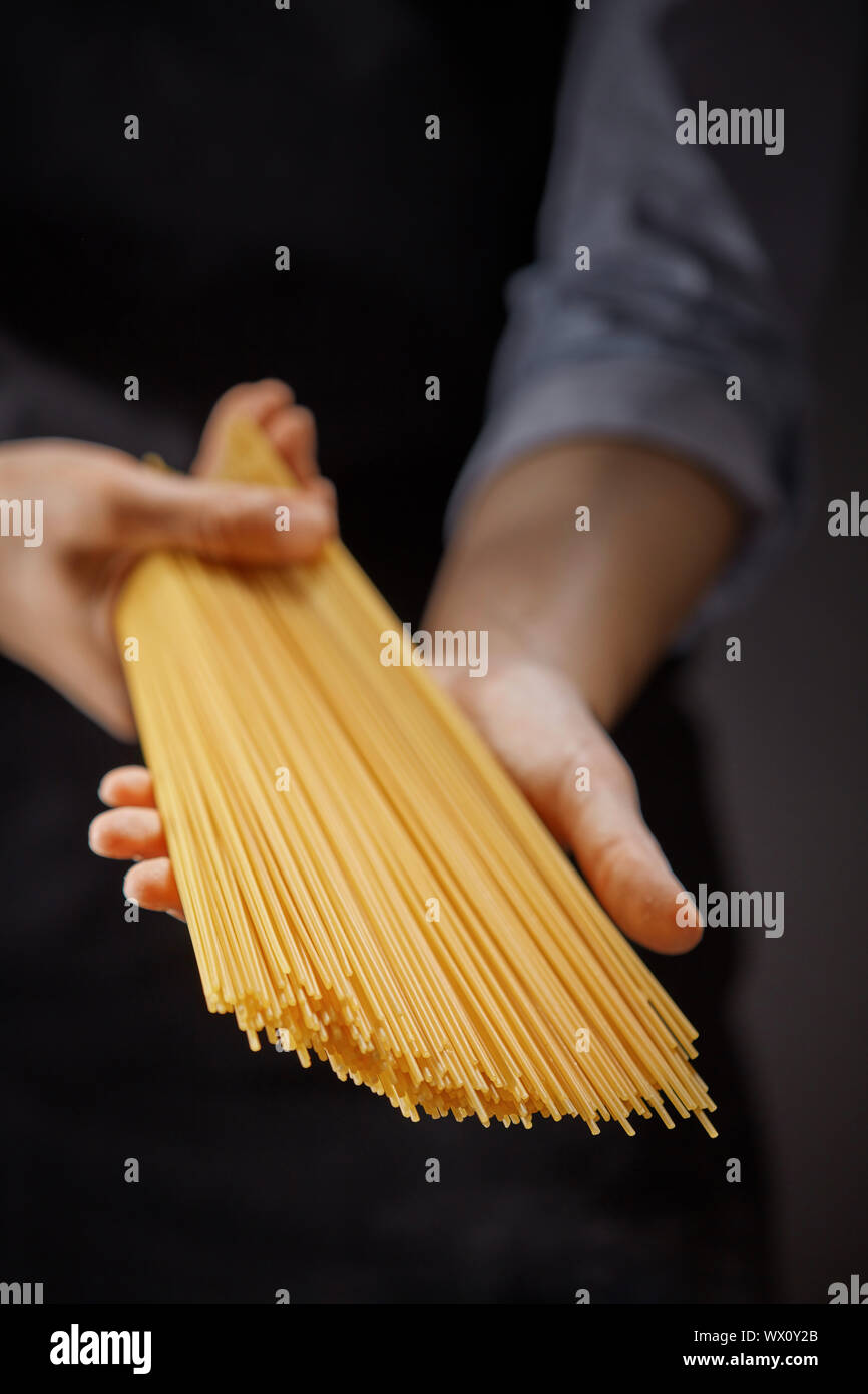 Woman holding spaghetti bolognese hi-res stock photography and images ...