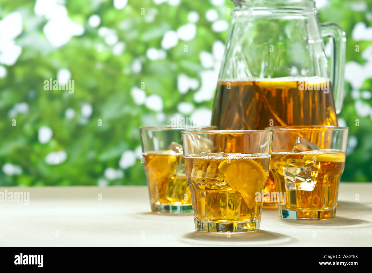 Iced Lemon Ice Tea in a summer setting Stock Photo - Alamy