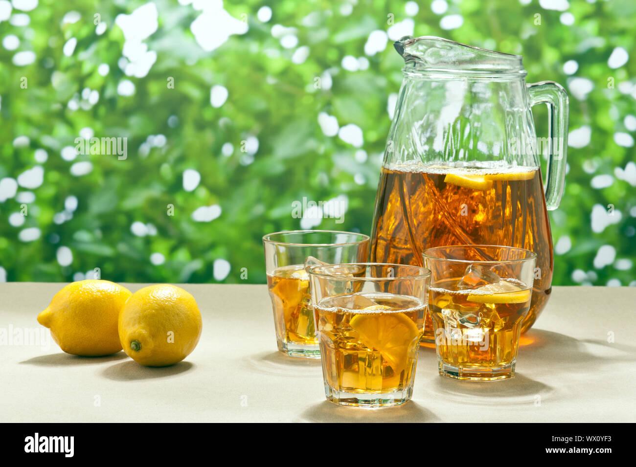 Iced Lemon Ice Tea in a summer setting Stock Photo - Alamy