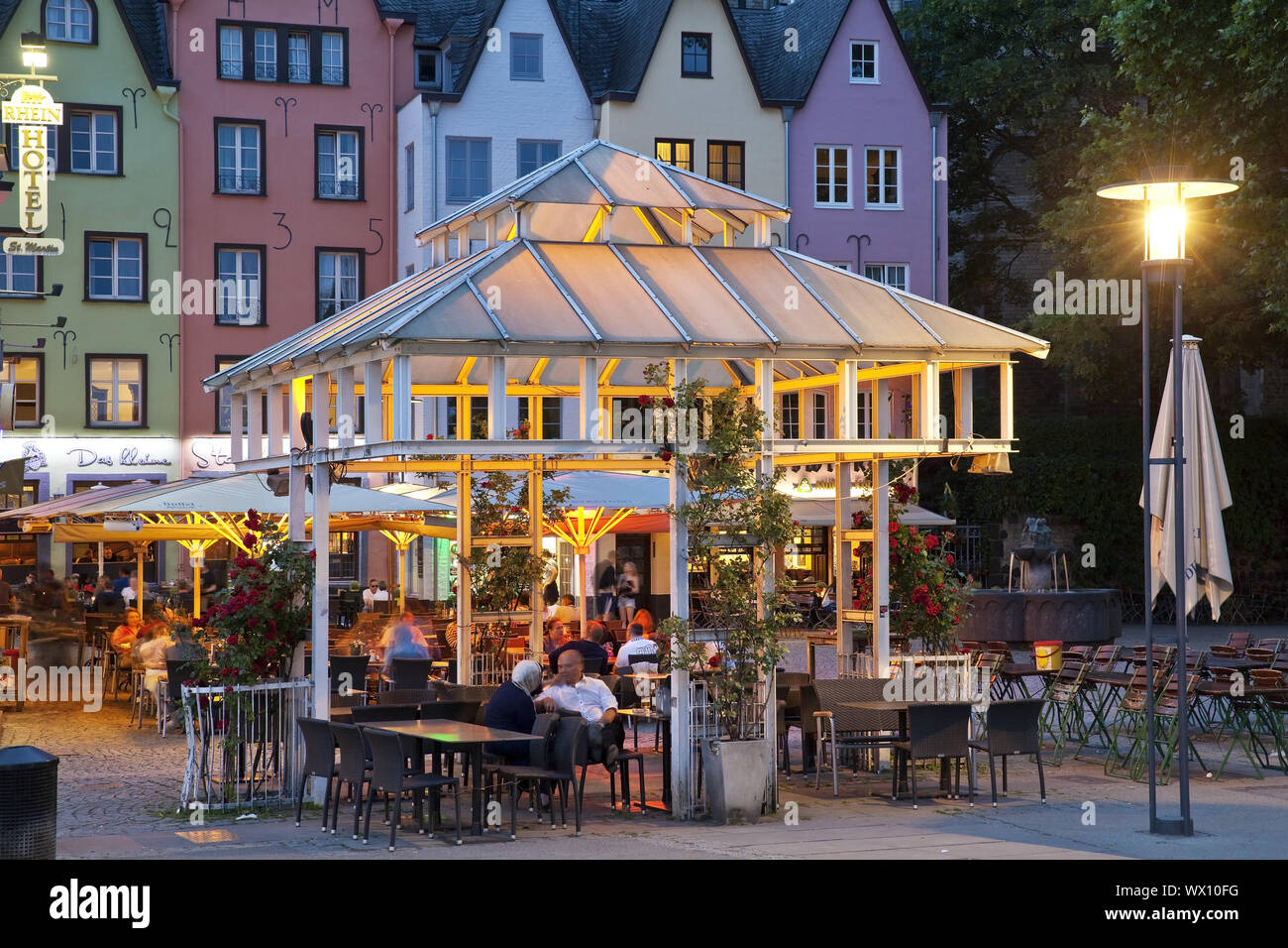 fish market in the old city with colourful houses at twilight, Cologne ...