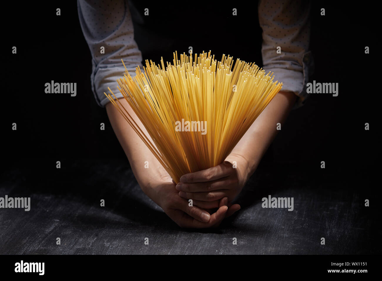 Woman holding spaghetti bolognese hi-res stock photography and images ...