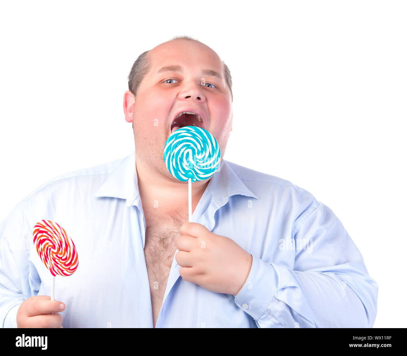 Fat Man in a Blue Shirt, Eating a Lollipop, isolated Stock Photo - Alamy