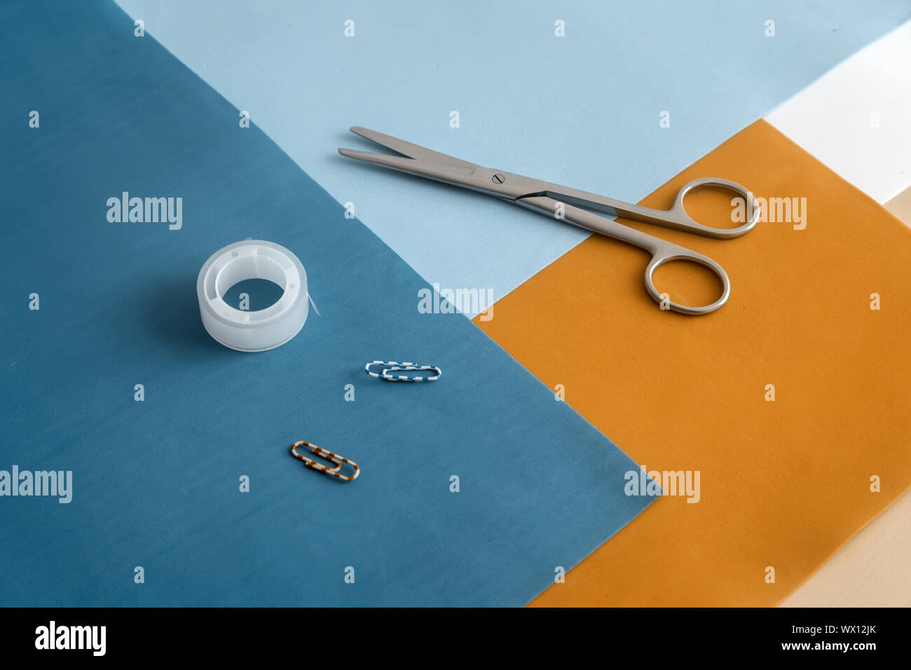 Sheets of paper in different colors and scissors Stock Photo - Alamy