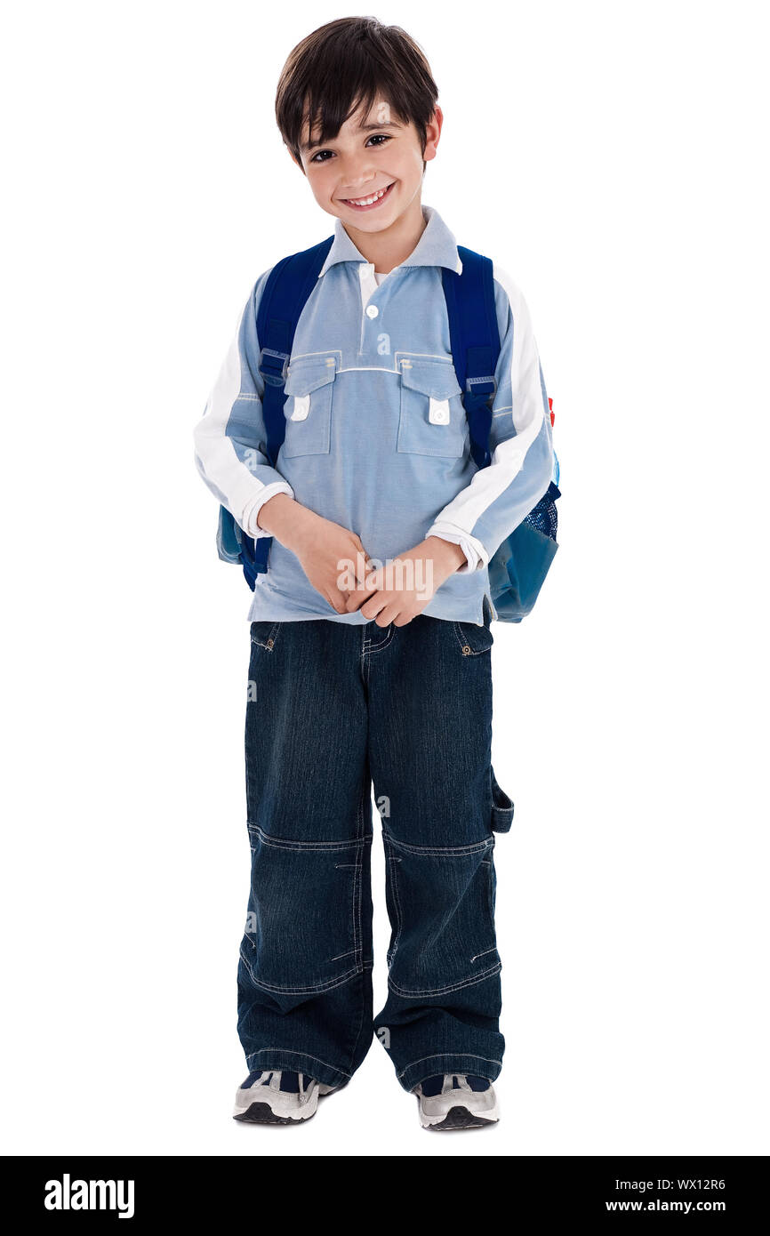 young boy standing in white isolated background Stock Photo - Alamy