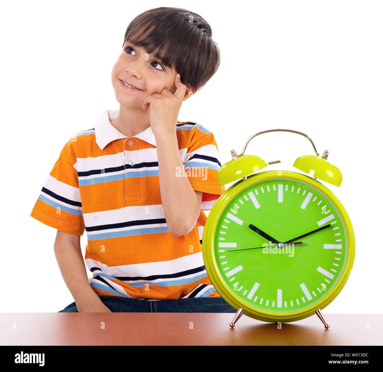 Boy thinking deeply near the clock Stock Photo - Alamy