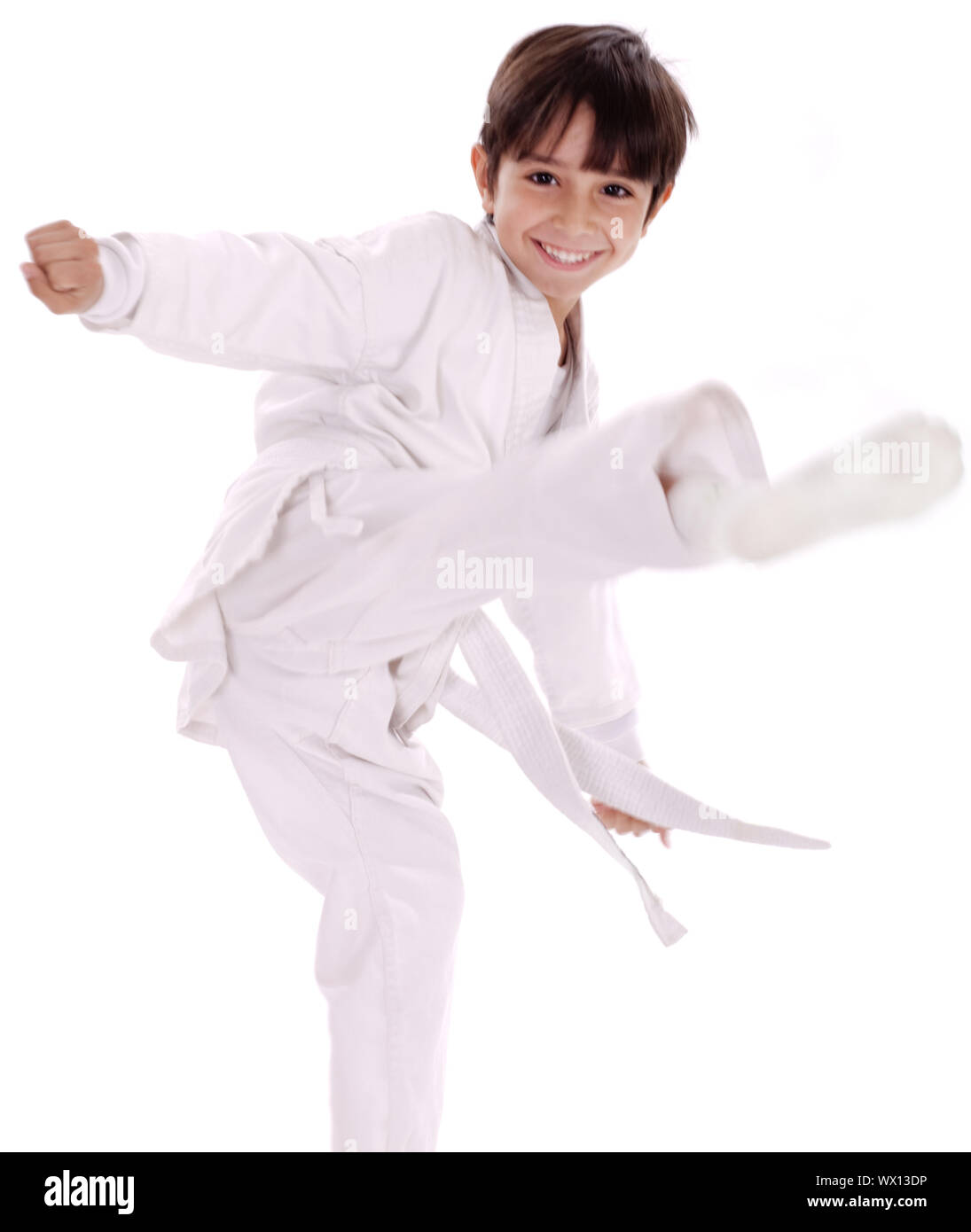 Karate boy excercising isolated white background Stock Photo - Alamy