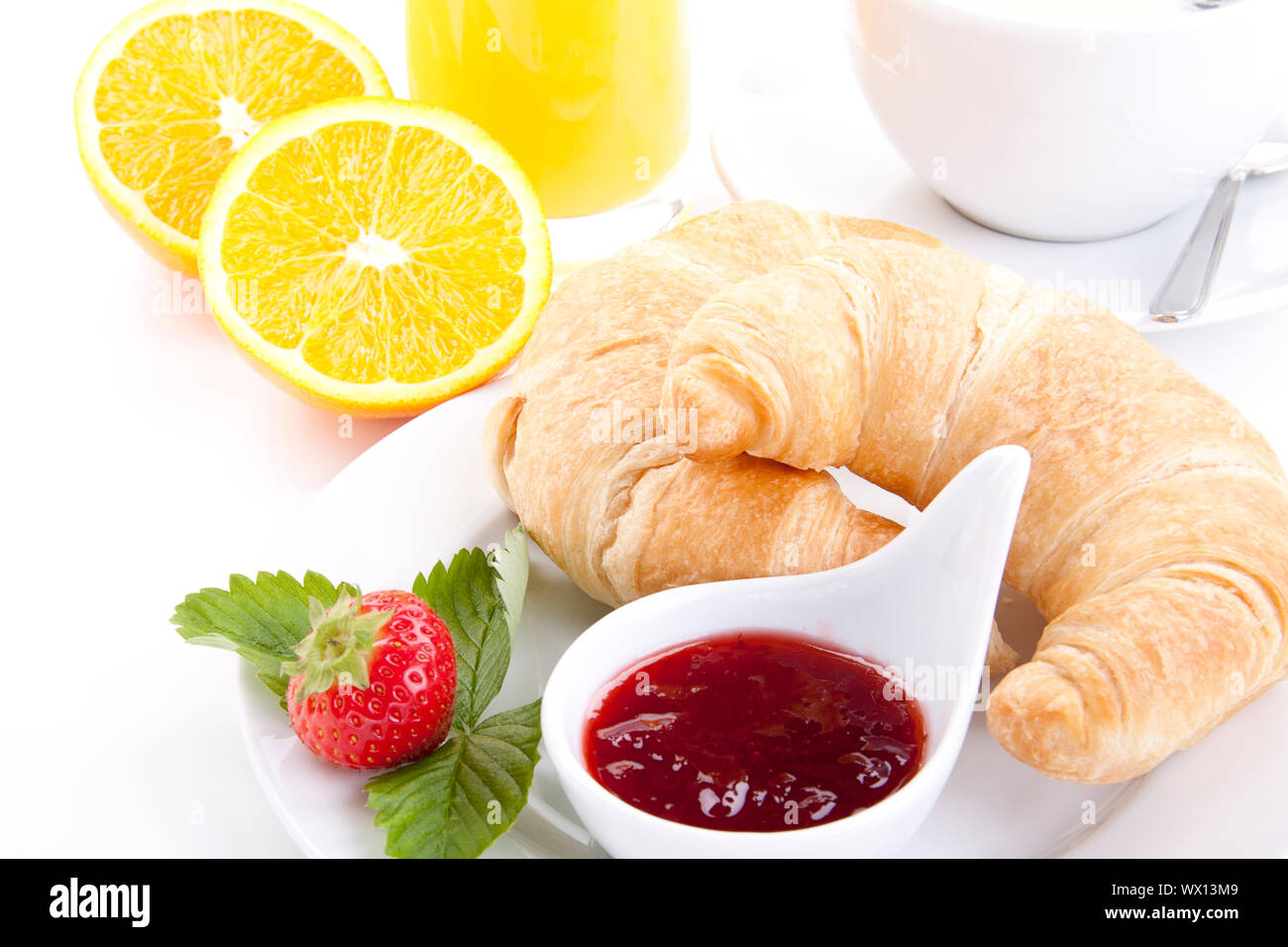 traditional french breakfast croissant isolated on white background ...