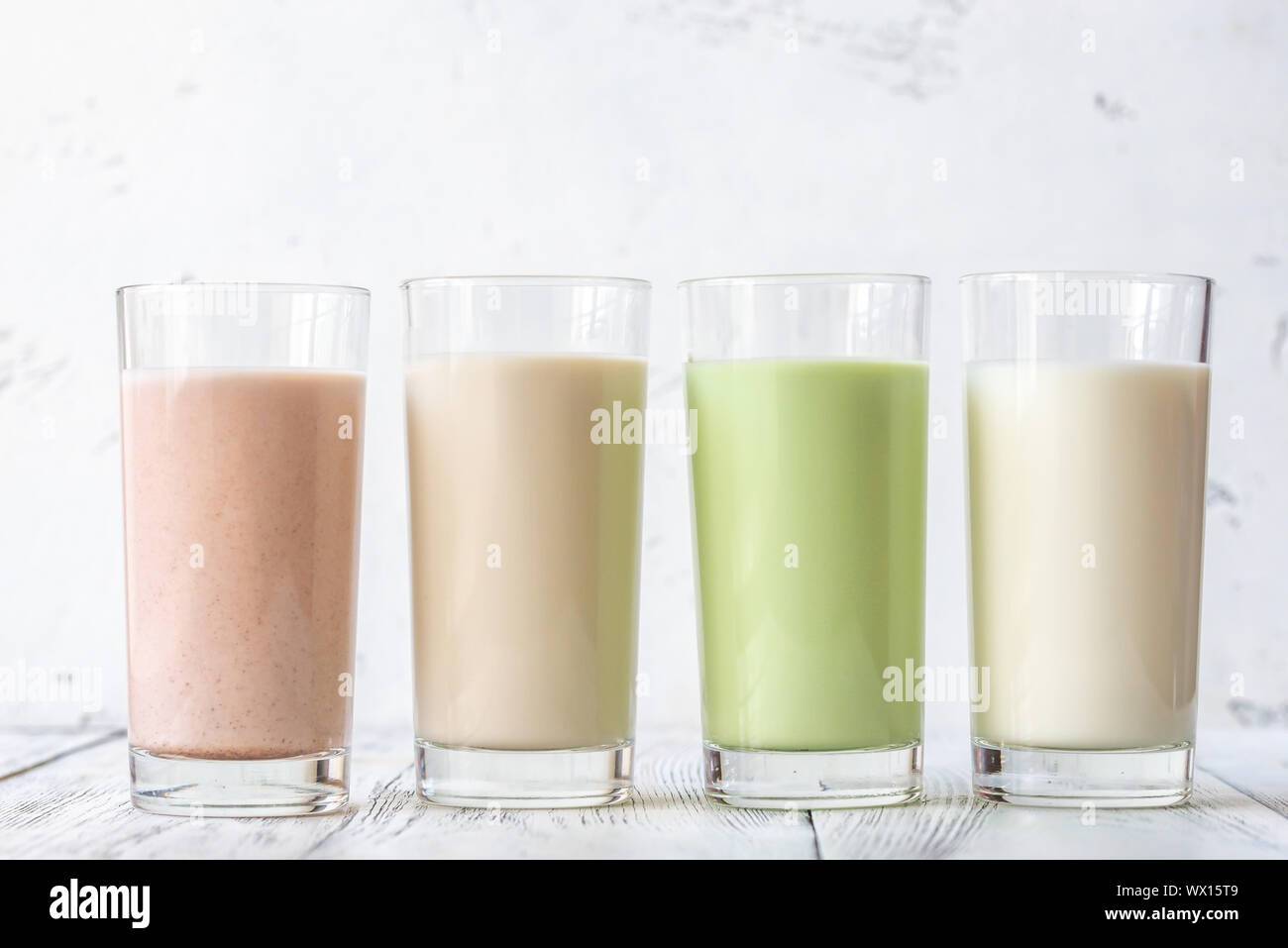 Assortment of different kinds of nut milk Stock Photo - Alamy