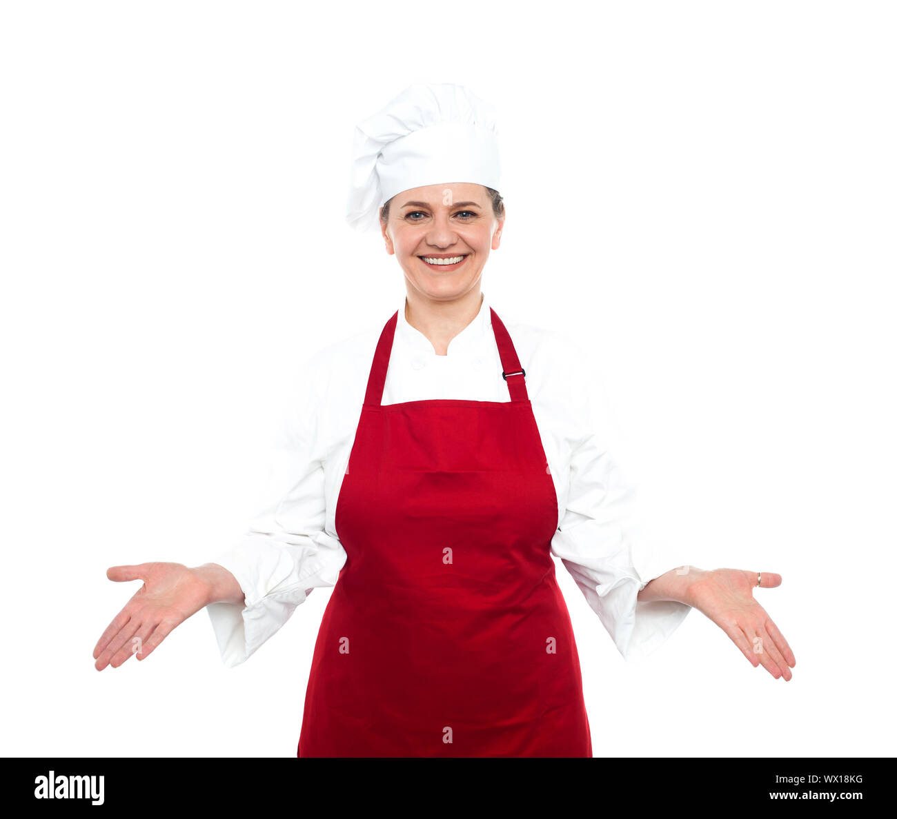 Female chef standing with open palms, warm welcome gesture Stock Photo ...