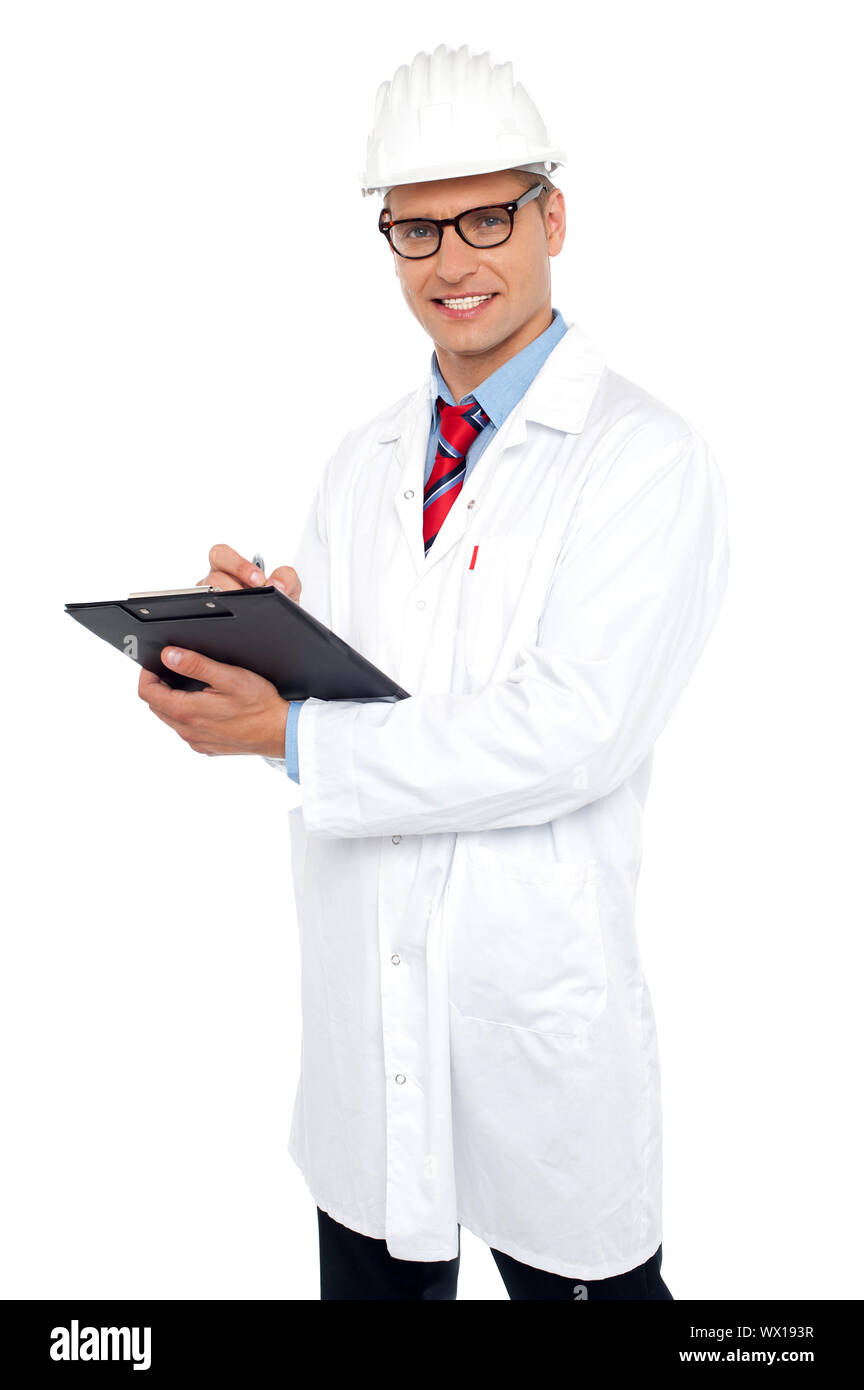 Engineer preparing report looking at you. All on white background Stock ...