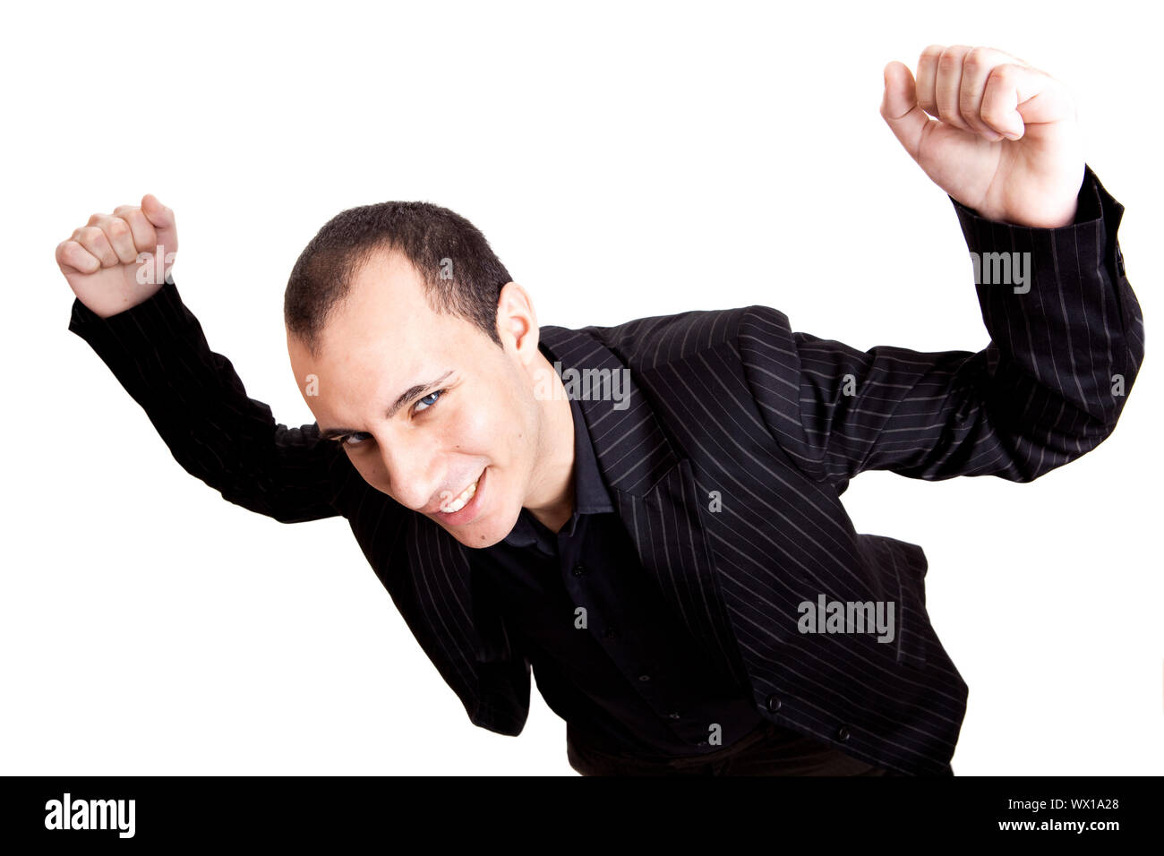 Top view of a young and happy businessman, isolated on white background ...