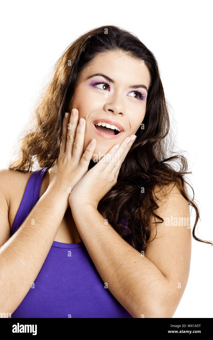 Beautiful young woman with a surprised look, isolated on white Stock ...