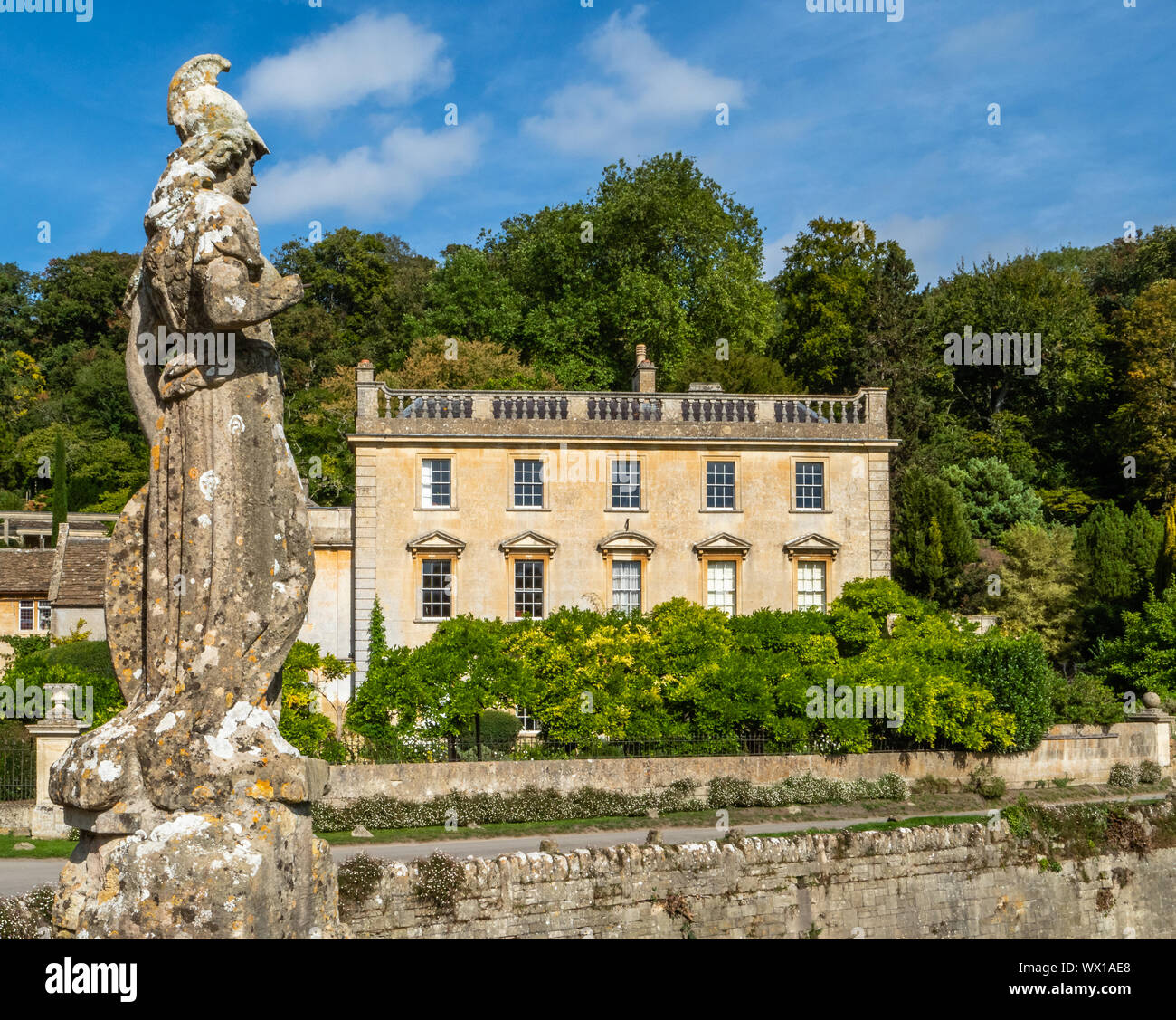 Statue of Britannia on the river bridge leading to Iford Manor a ...