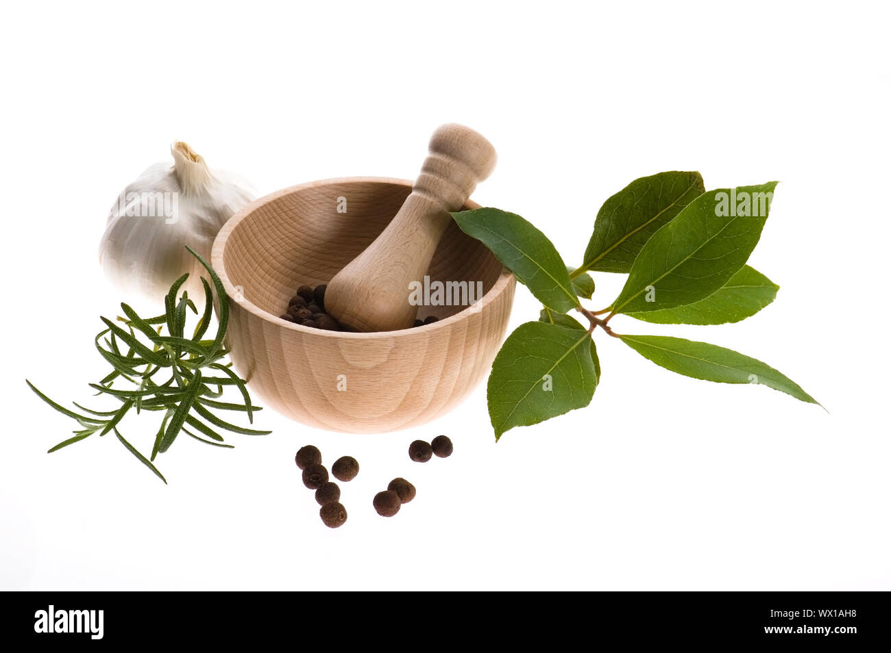 Mortar pestle fresh spices Cut Out Stock Images & Pictures - Alamy