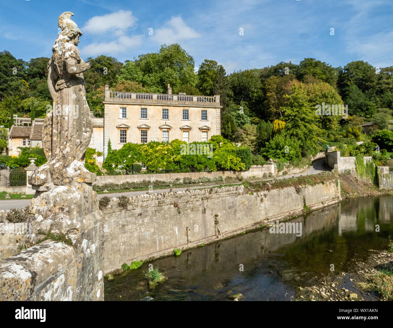 Statue of Britannia on the river bridge leading to Iford Manor a ...