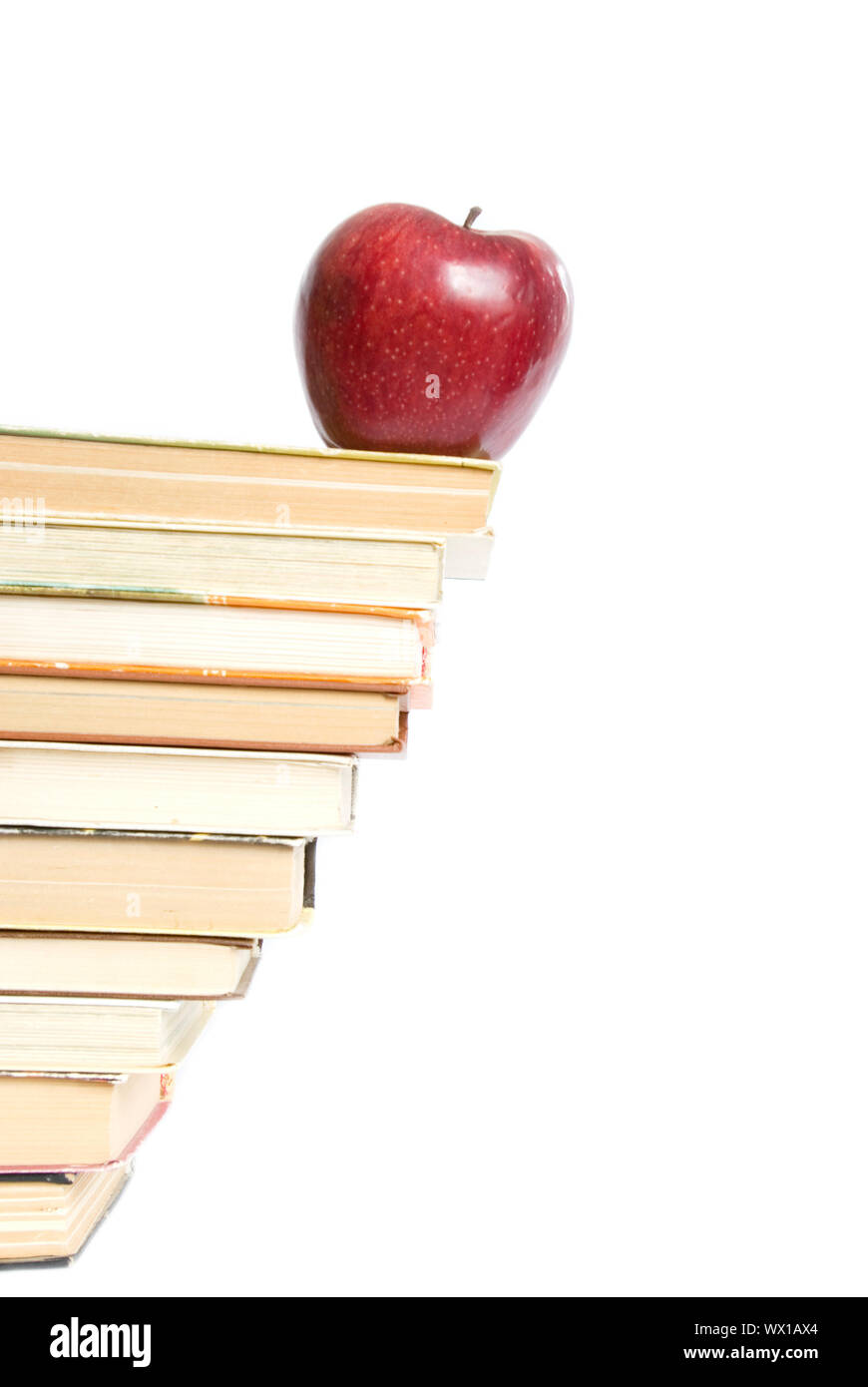 Red apple and stack of books for school Stock Photo - Alamy