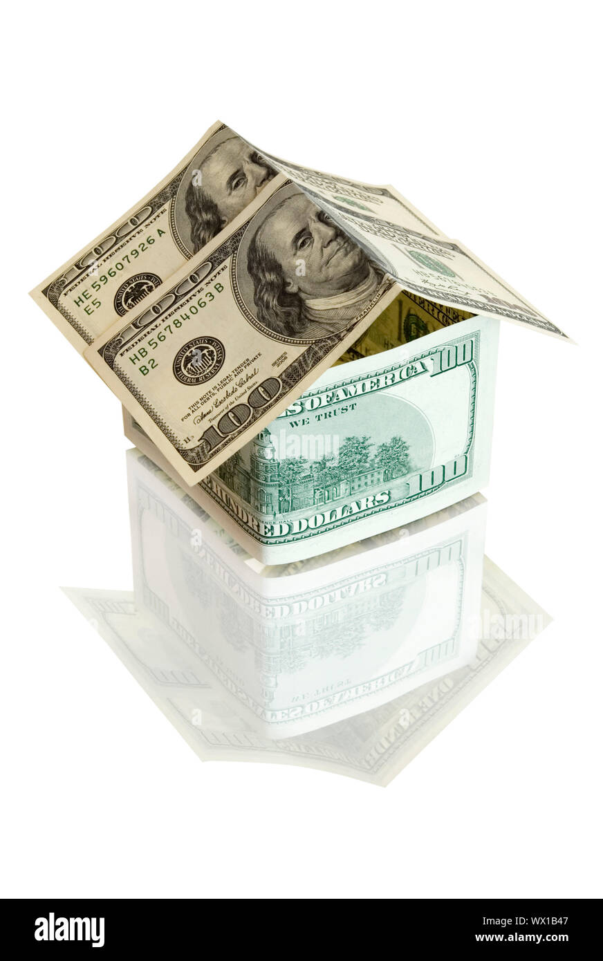 Money house on white background Stock Photo - Alamy