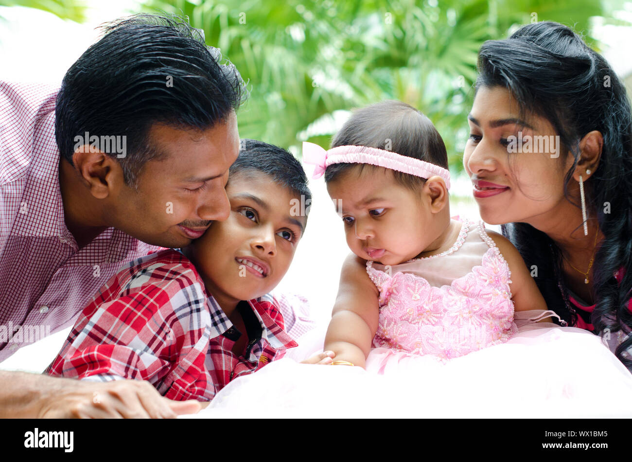 Happy Indian family having fun time at outdoor Stock Photo - Alamy