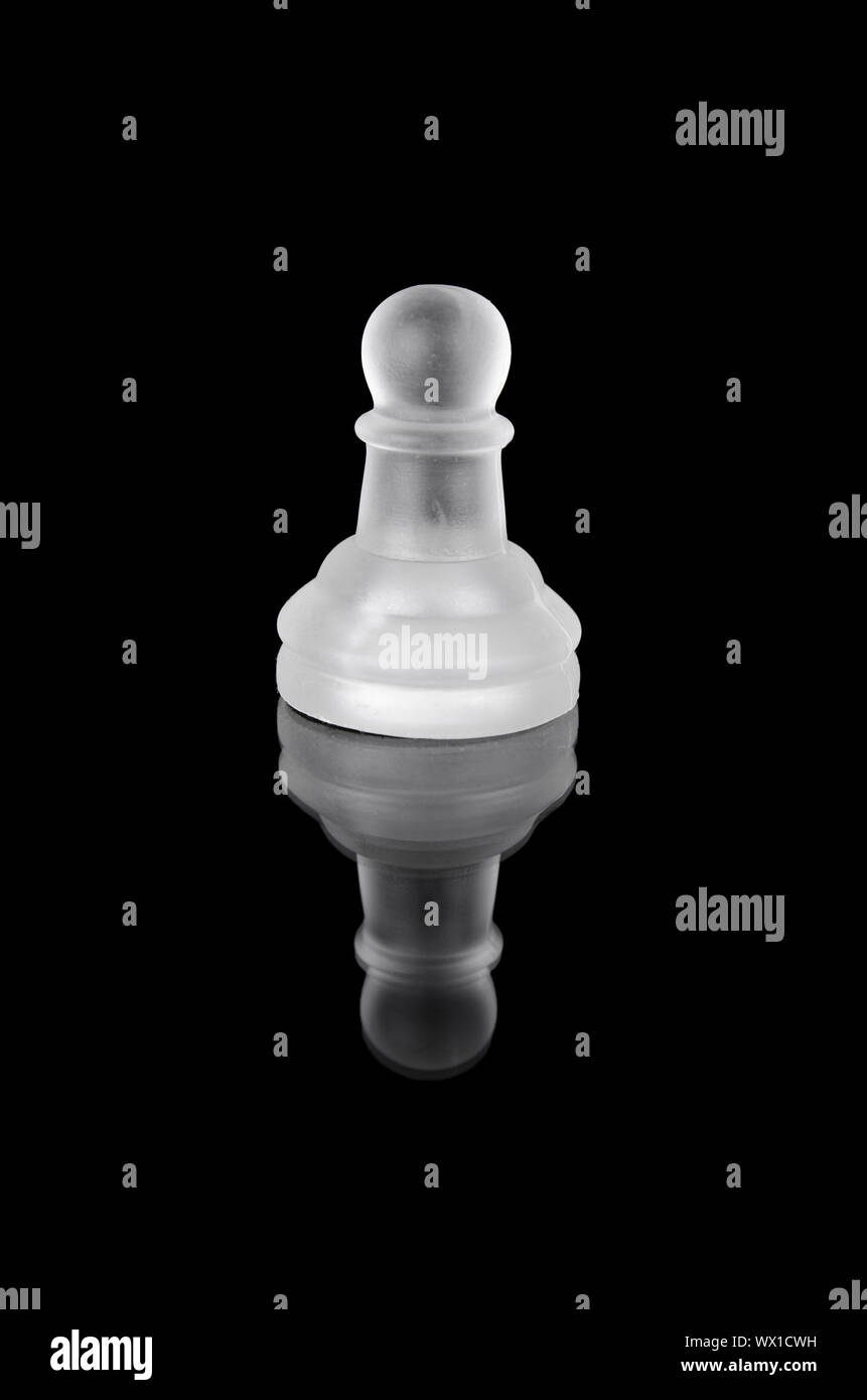 Glass chess pawn on black isolated background Stock Photo - Alamy