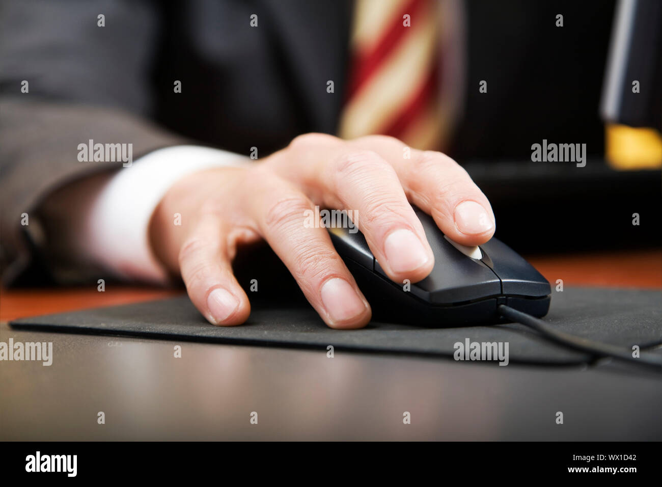 people at work: close-up of a businessman's hand using a mouse Stock ...