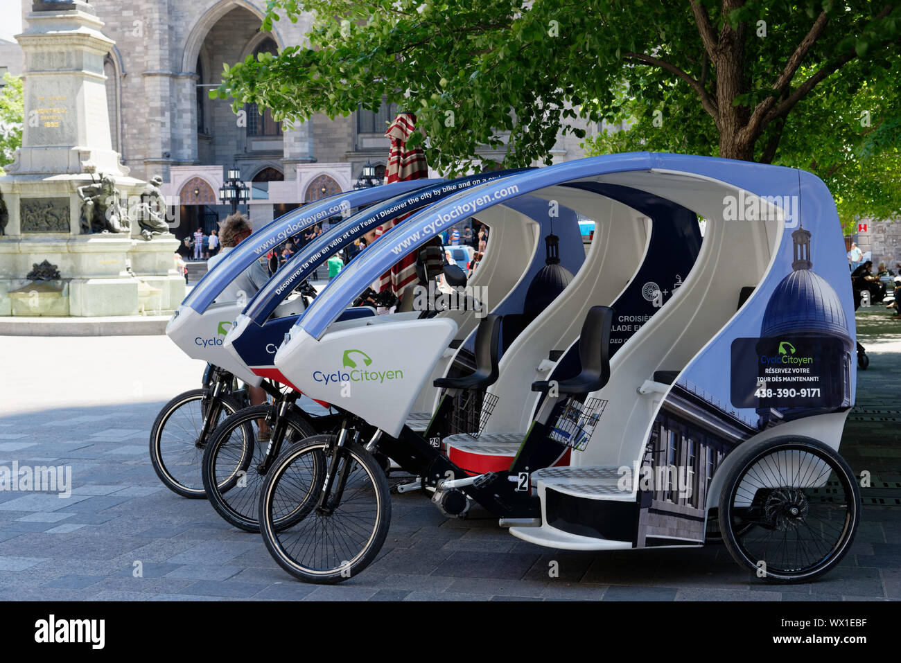 Cycle rickshaws parked outside the Basilique in Montreal, Quebec Stock ...