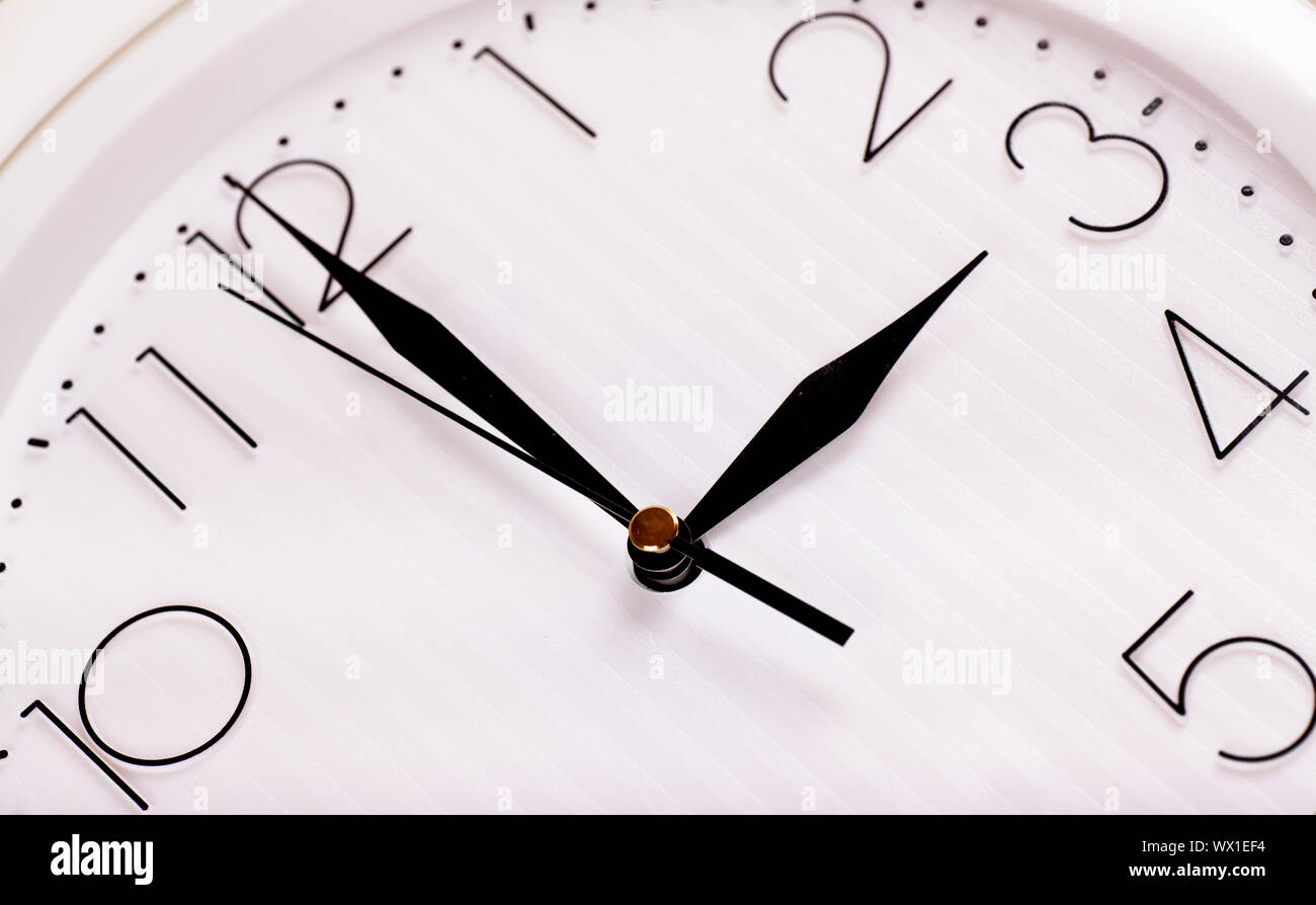 Closeup of clock face. Three o'clock Stock Photo - Alamy