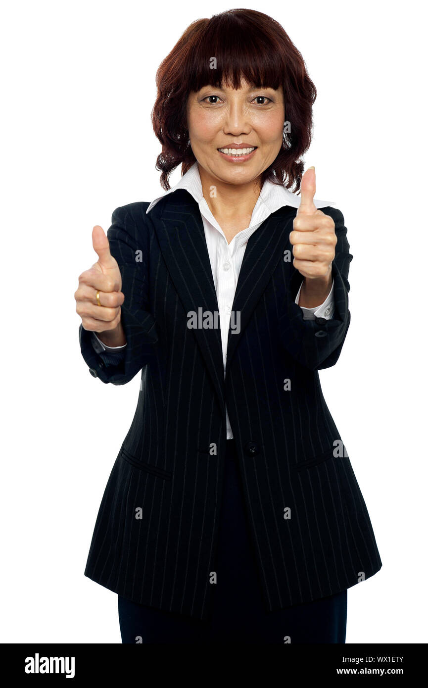 Satisfied asian businesswoman showing double thumbs-up to you Stock ... Satisfied asian businesswoman showing double thumbs-up to you Stock ...