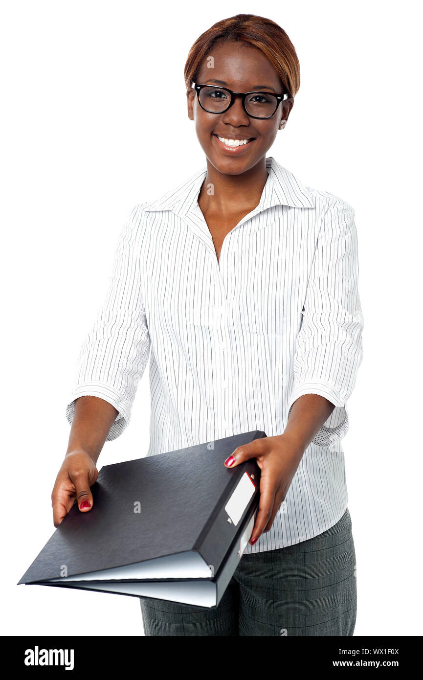 Confident female secretary submitting her binder to her boss Stock ...