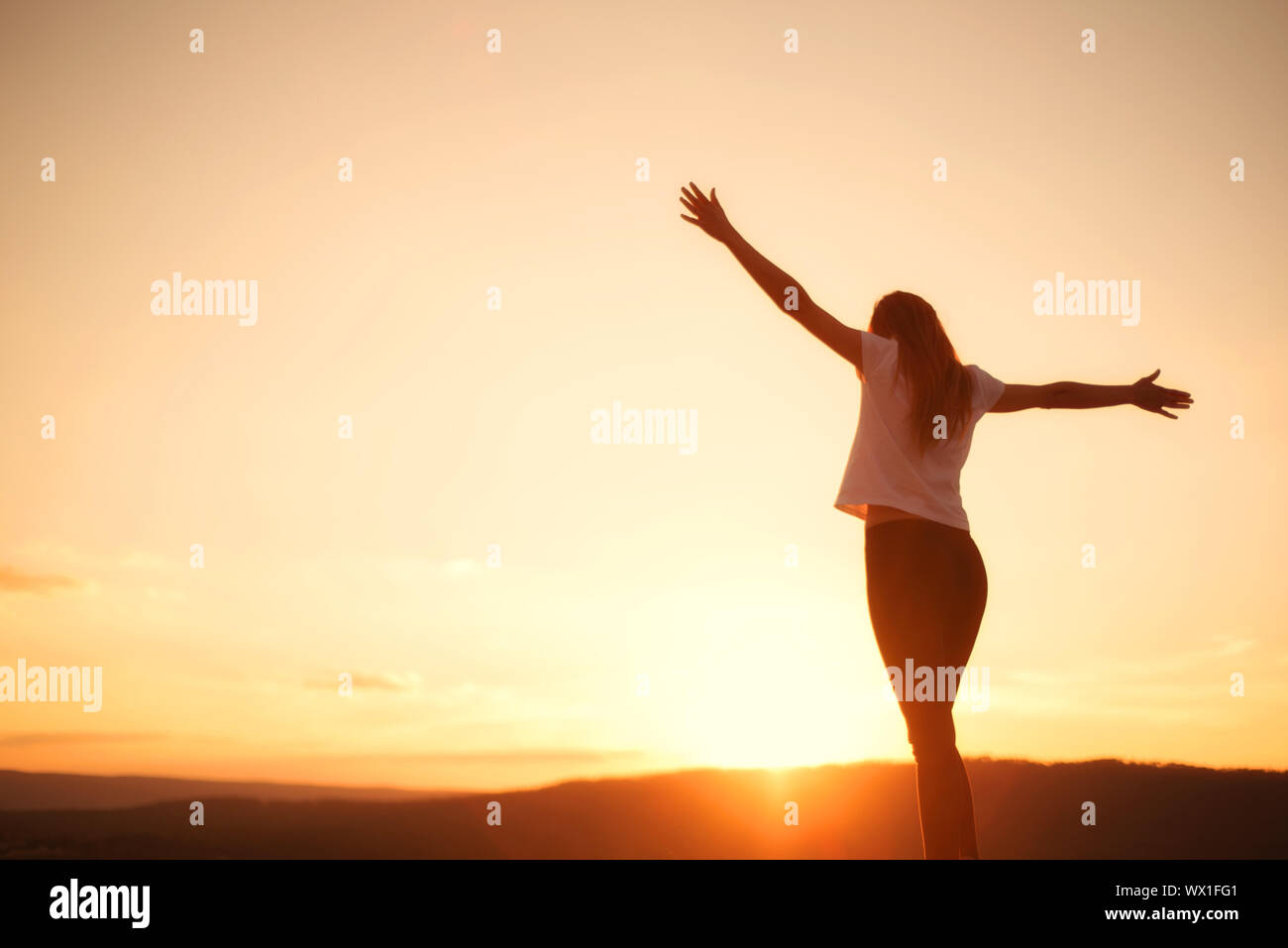 Woman open arms under hi-res stock photography and images - Alamy