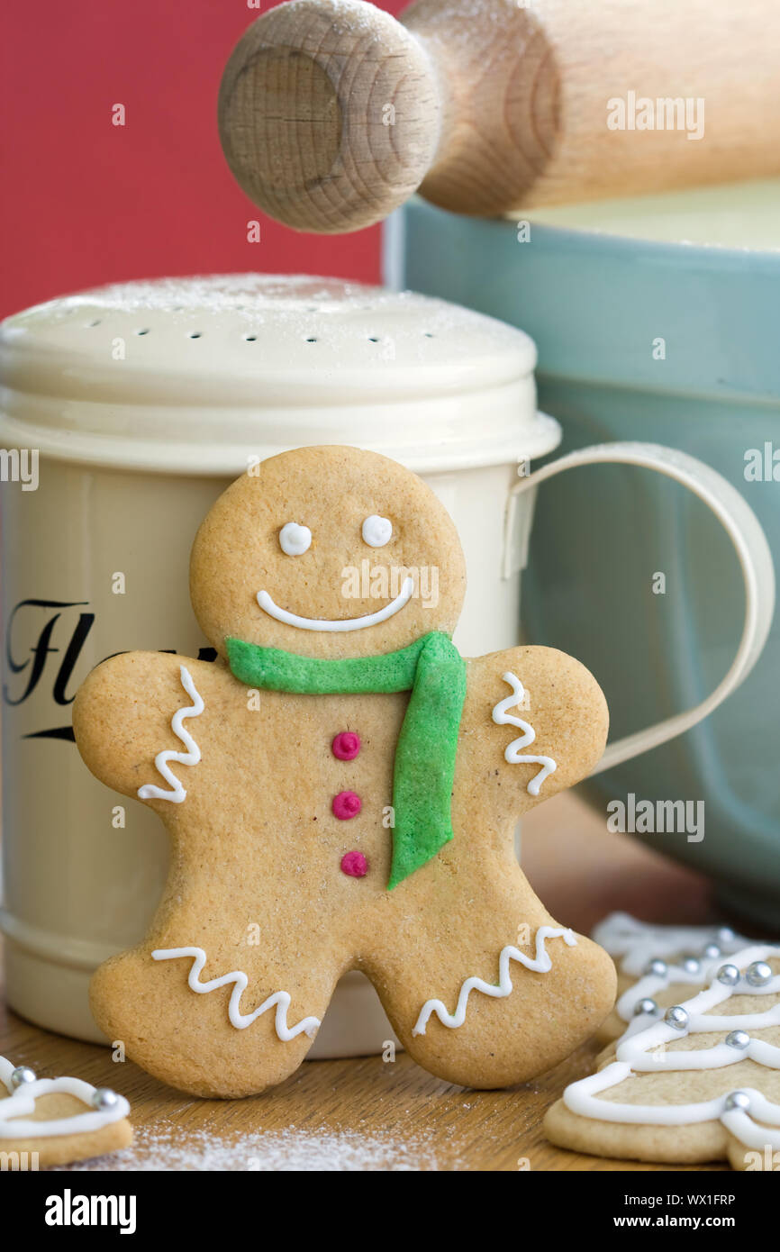 Smiling gingerbread man with scarf and buttons Stock Photo - Alamy
