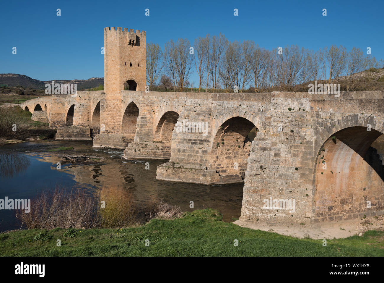 Medieval bridge over Ebro river in the ancient city of Frias, Burgos ...